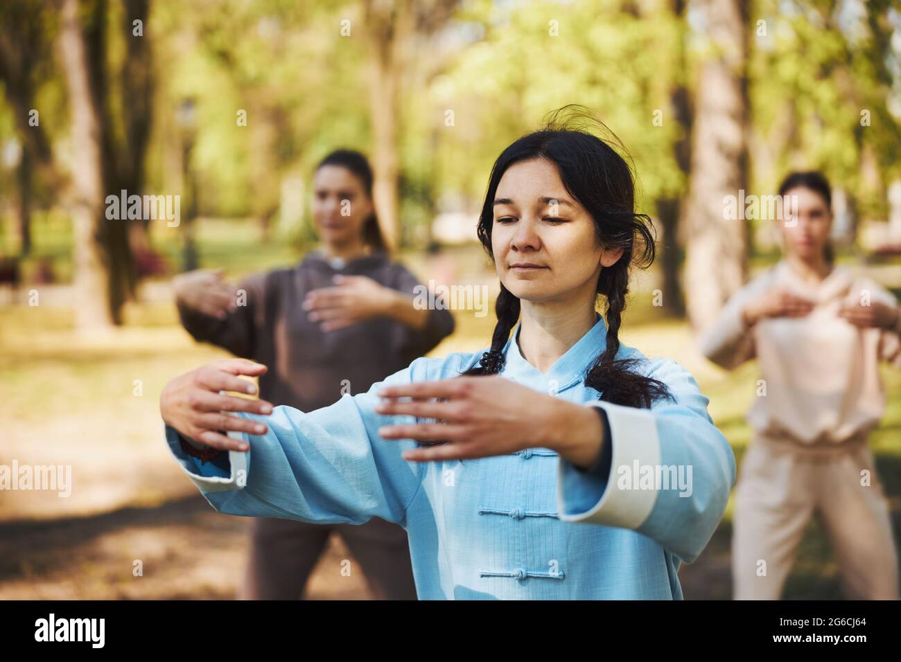 Wrapping his arms hi-res stock photography and images - Alamy