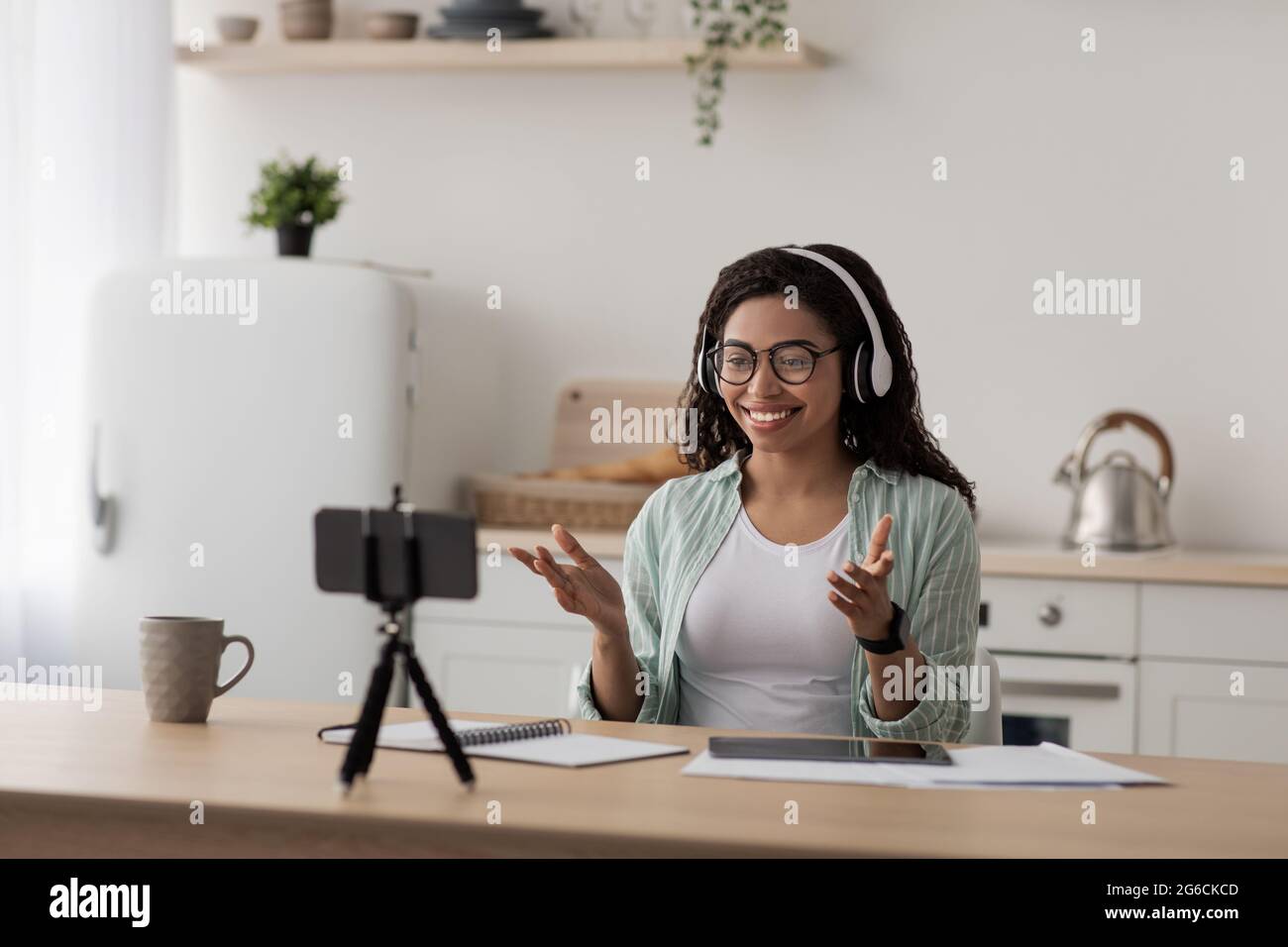 Businesswoman teacher lecturer recording educational video, greeting ...