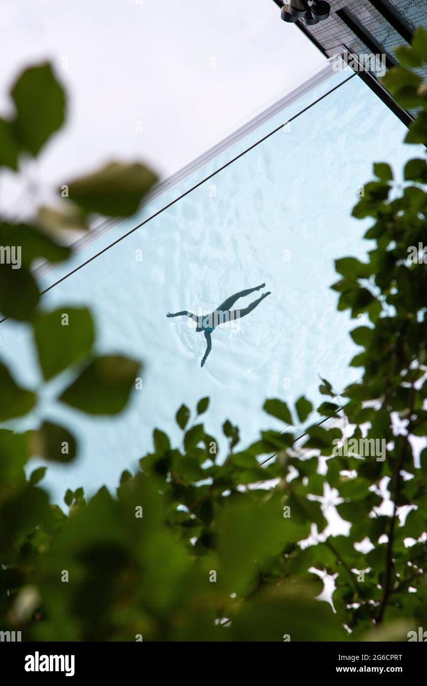 The 35-metre-high transparent Sky Pool bridge between two buildings at ...