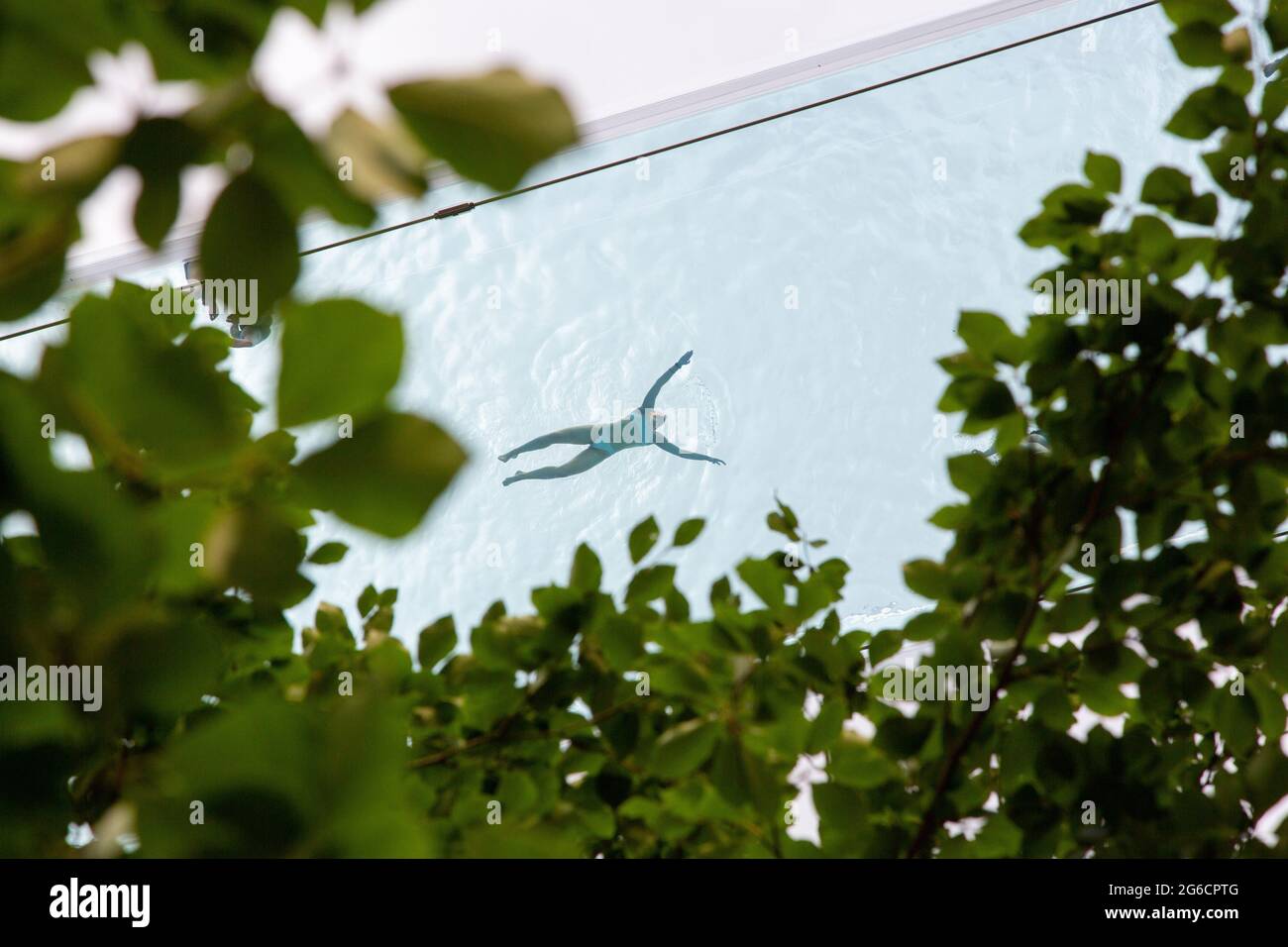 The 35-metre-high transparent Sky Pool bridge between two buildings at ...