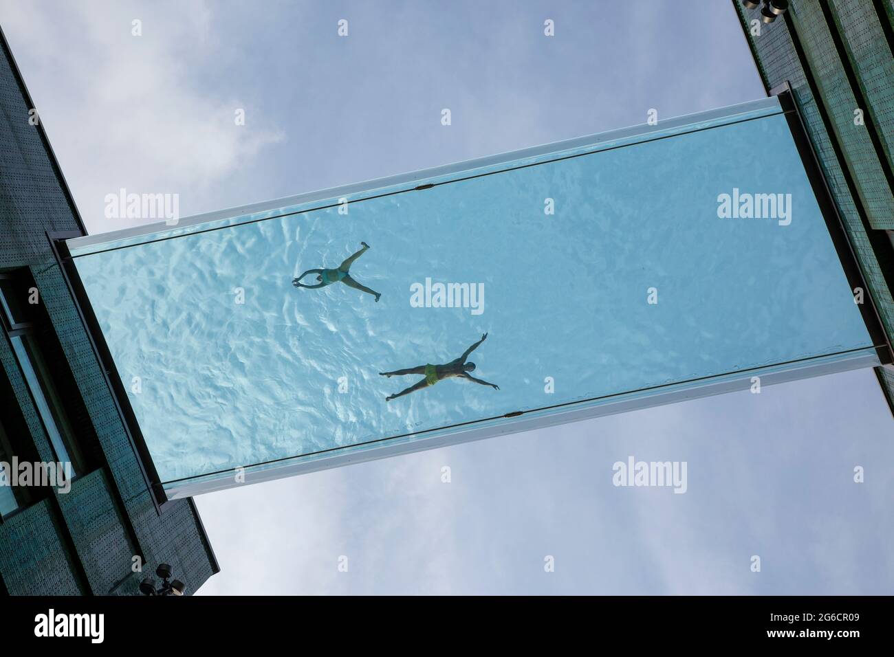 The 35-metre-high transparent Sky Pool bridge between two buildings at ...