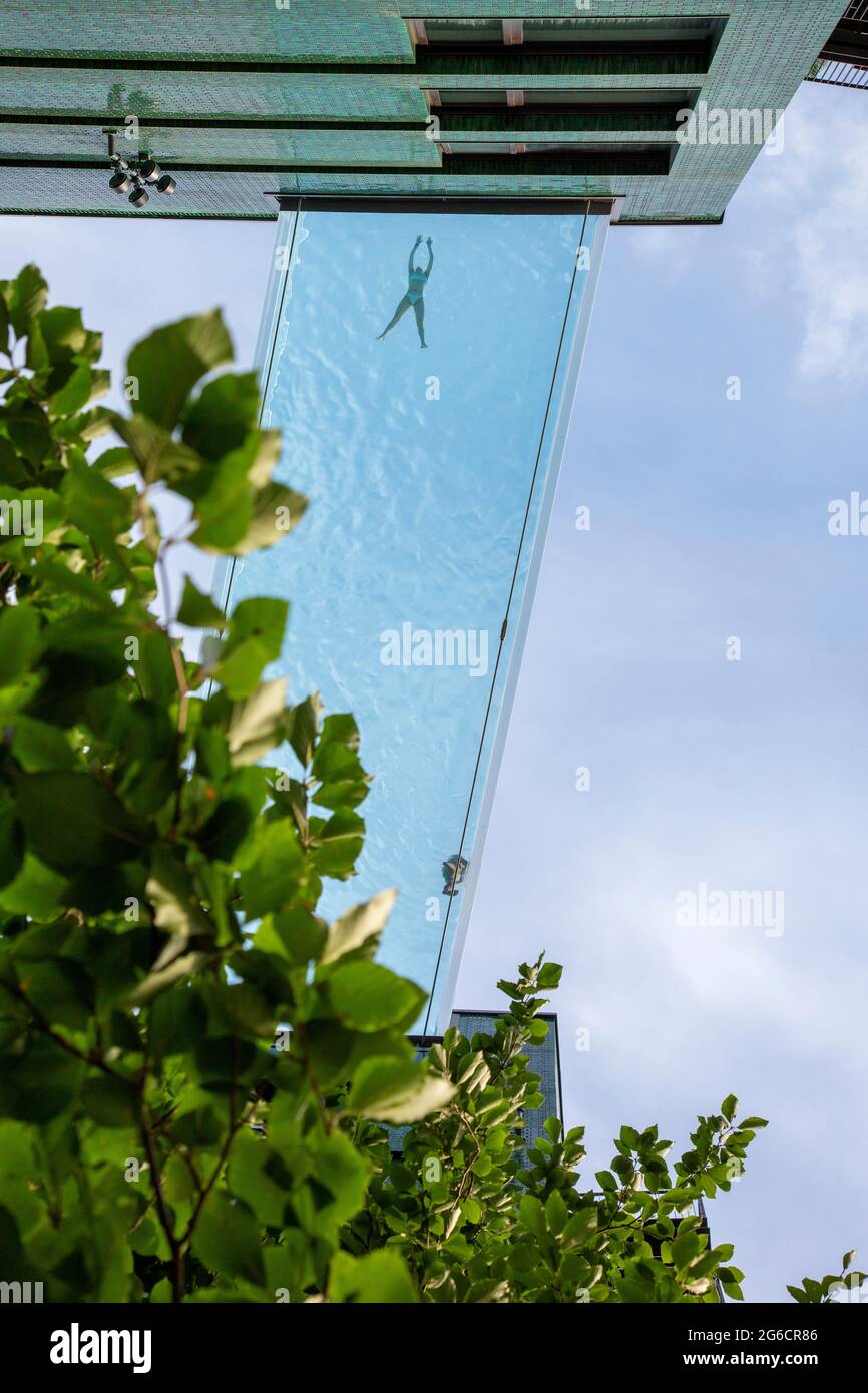 The 35-metre-high transparent Sky Pool bridge between two buildings at ...