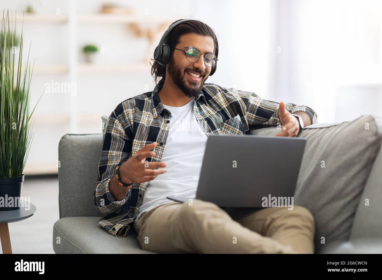 Man reclining on couch in hi-res stock photography and images - Alamy