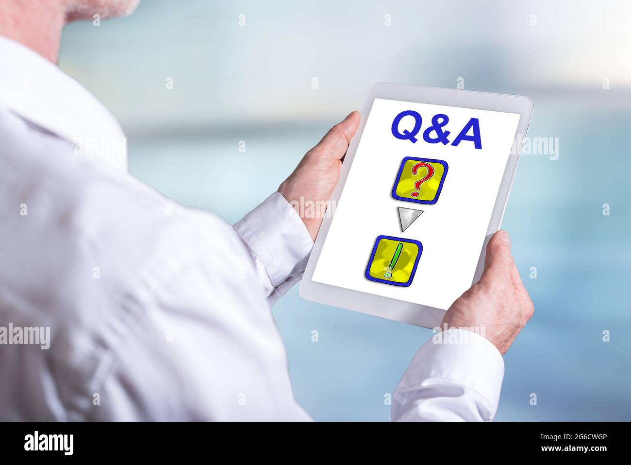 Tablet screen displaying a q&a concept Stock Photo - Alamy