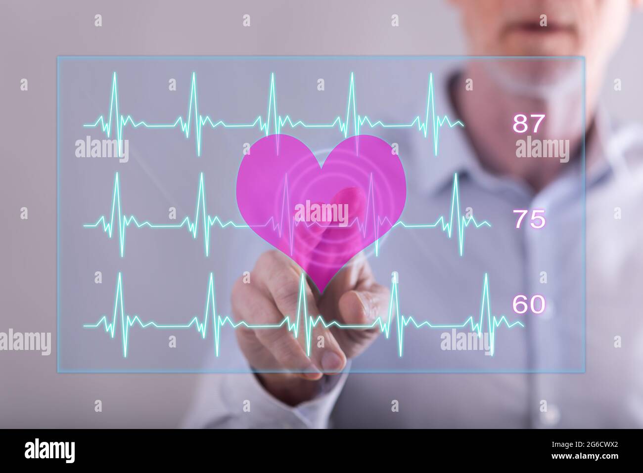 Man touching a heart beats graph concept on a touch screen with his ...