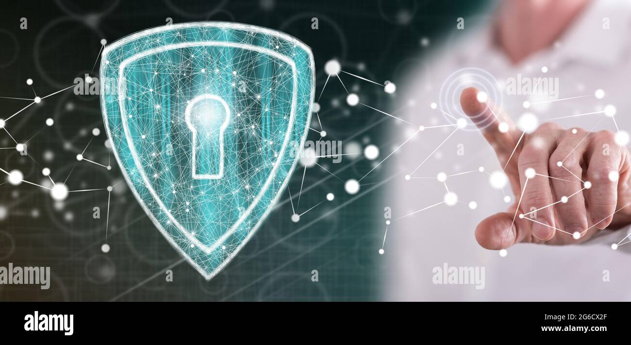 Man touching a digital security concept on a touch screen with his ...