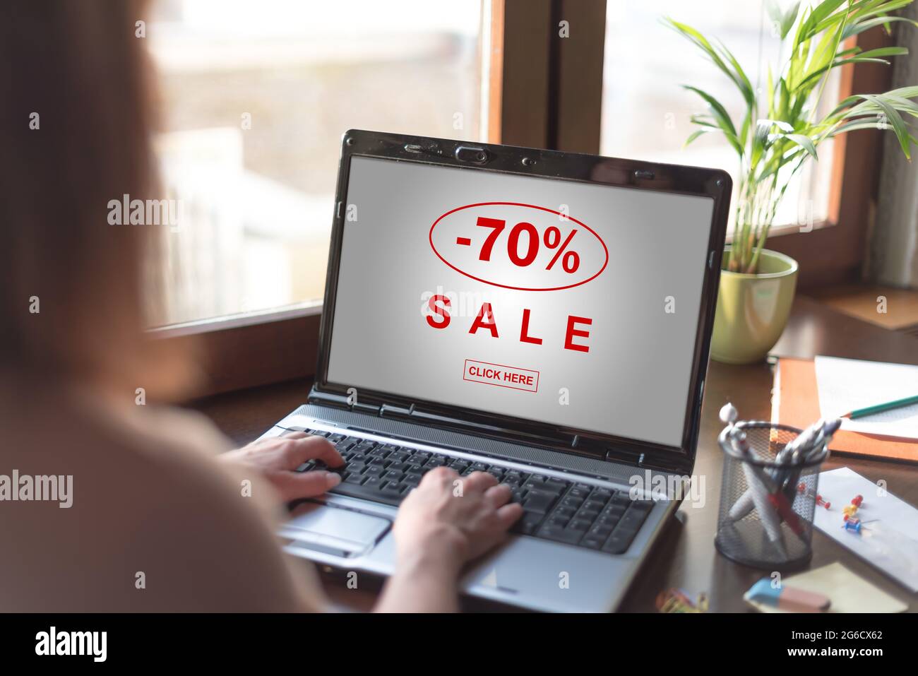 Laptop screen displaying a sale concept Stock Photo - Alamy