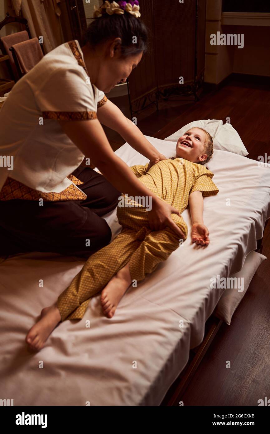 Happy girl on exercises for good health Stock Photo - Alamy