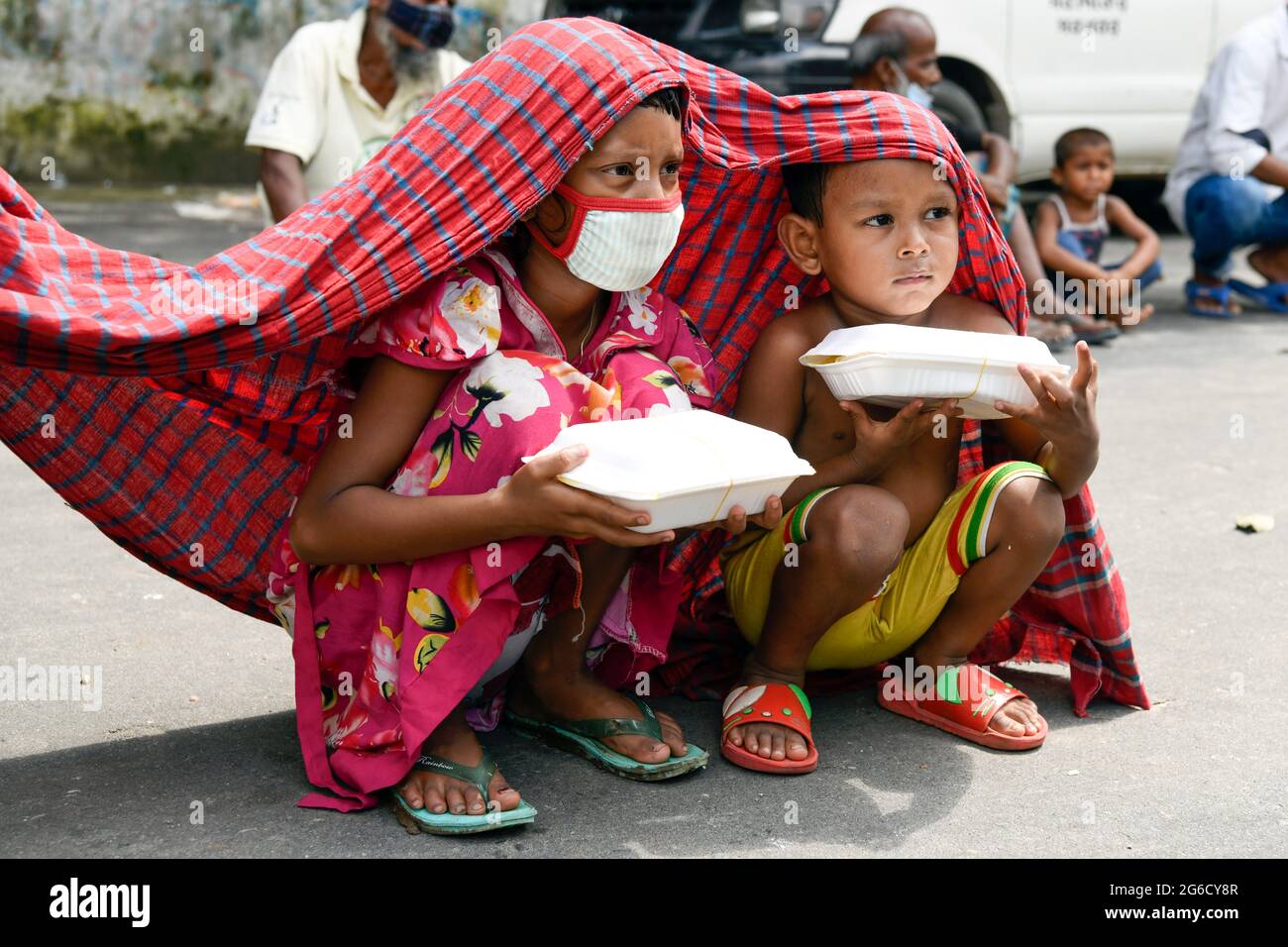 Dhaka, Bangladesh. 05th July, 2021. Children are seen on the road ...