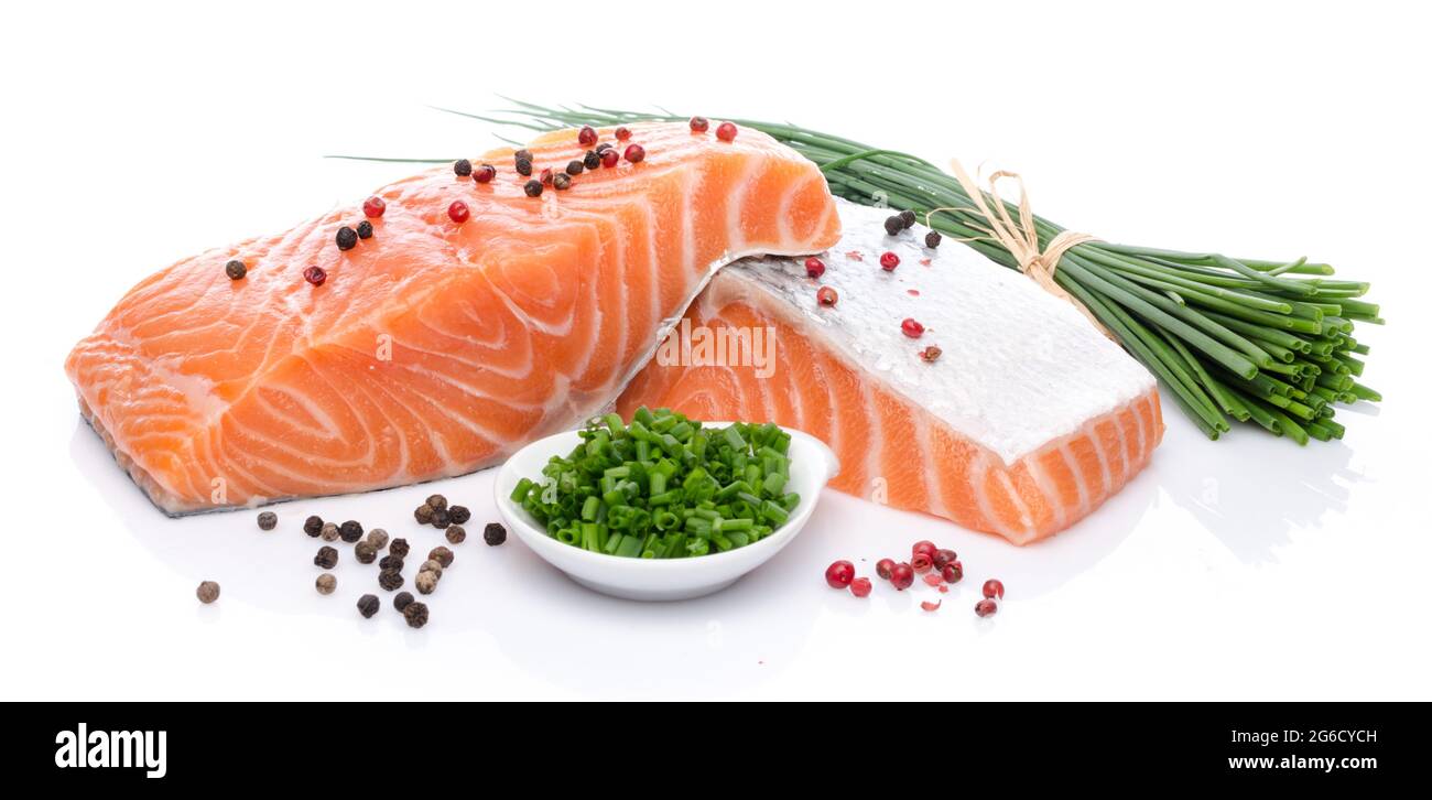 Fresh raw salmon fillet with herbs and spice, isolated on white Stock ...