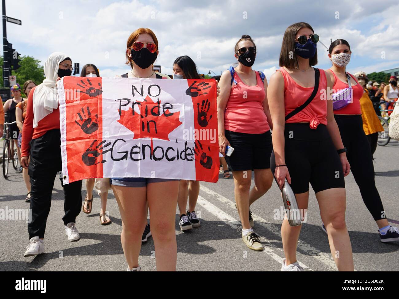 Montreal,Quebec,Canada,July 1, 2021.People carrying signs to protest ...