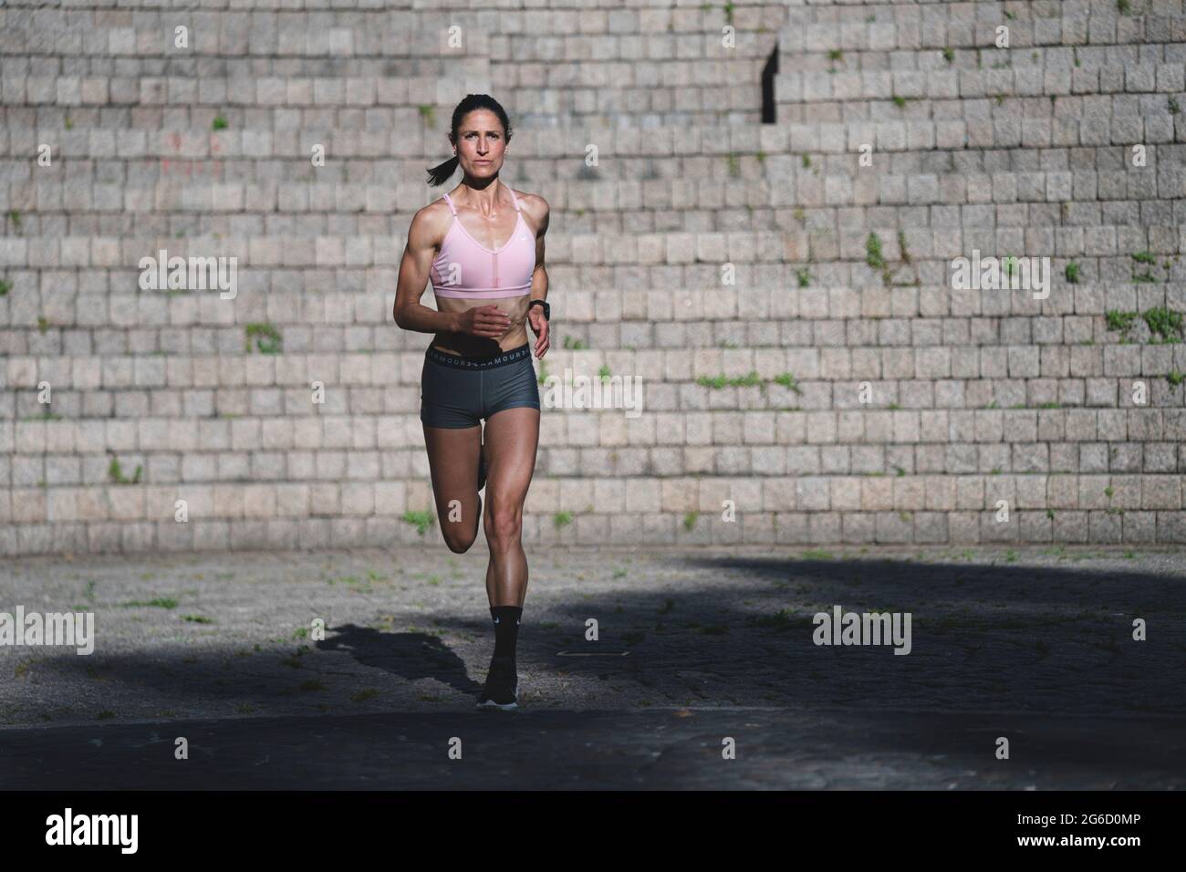 Girl running in the city, it's her lifestyle Stock Photo - Alamy