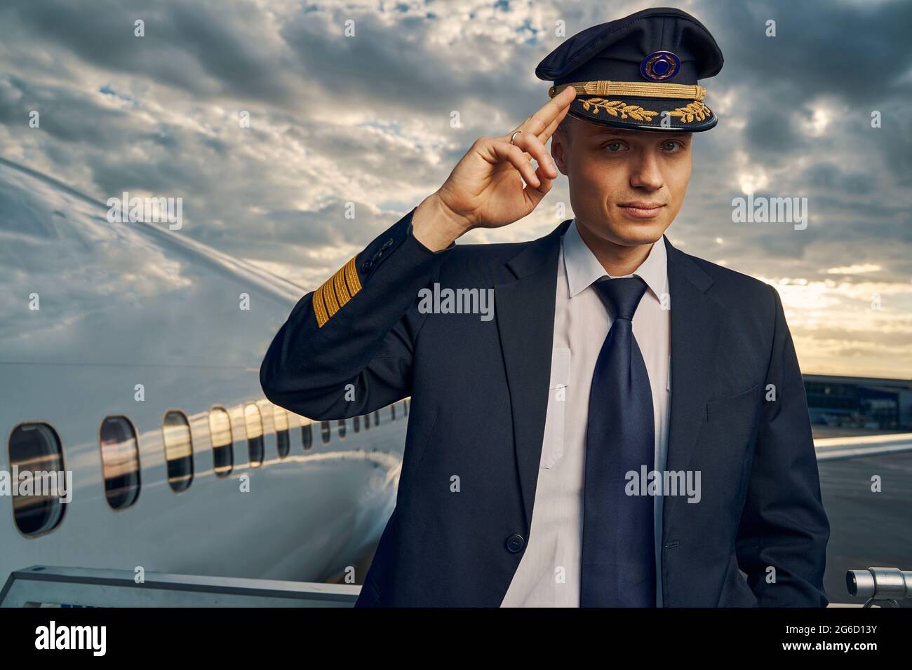 Male pilot demonstrating his readiness for flight Stock Photo - Alamy