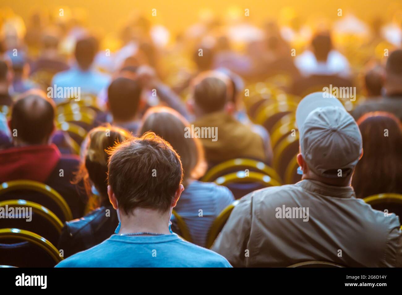 Business conference attendees sit and listen Stock Photo - Alamy