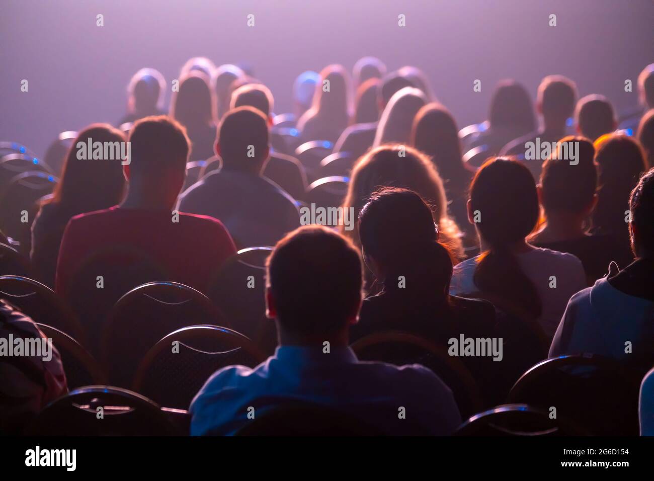 Business conference attendees sit and listen Stock Photo - Alamy