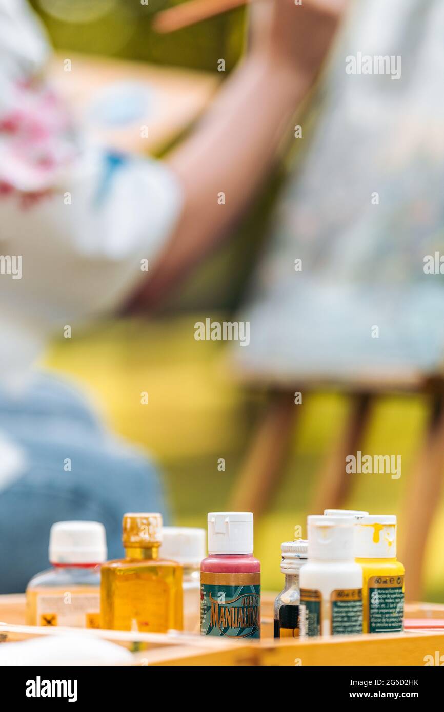 Paint containers on a surface Stock Photo - Alamy