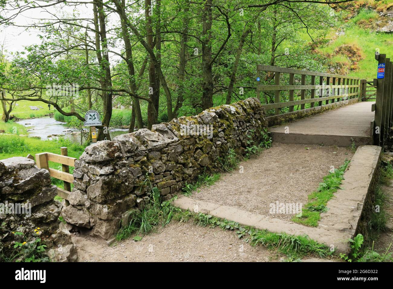 Bridge across the River Dove at the entrance to Wolfscote Dale in the ...
