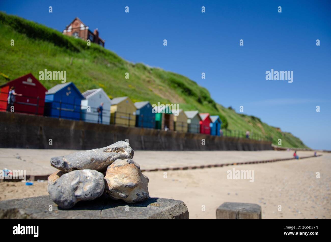 The beach and beach huts at the seaside resort of Mundesley, Norfolk ...