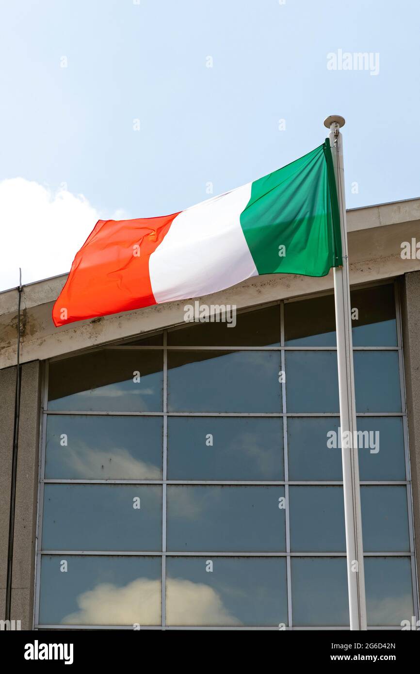 Italian National Flag Tricolor in Front of Building Stock Photo - Alamy