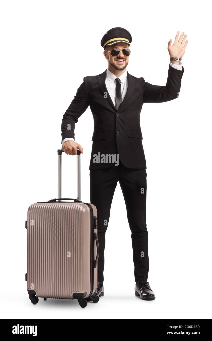Full length portrait of a pilot posing with a suitcase and waving ...