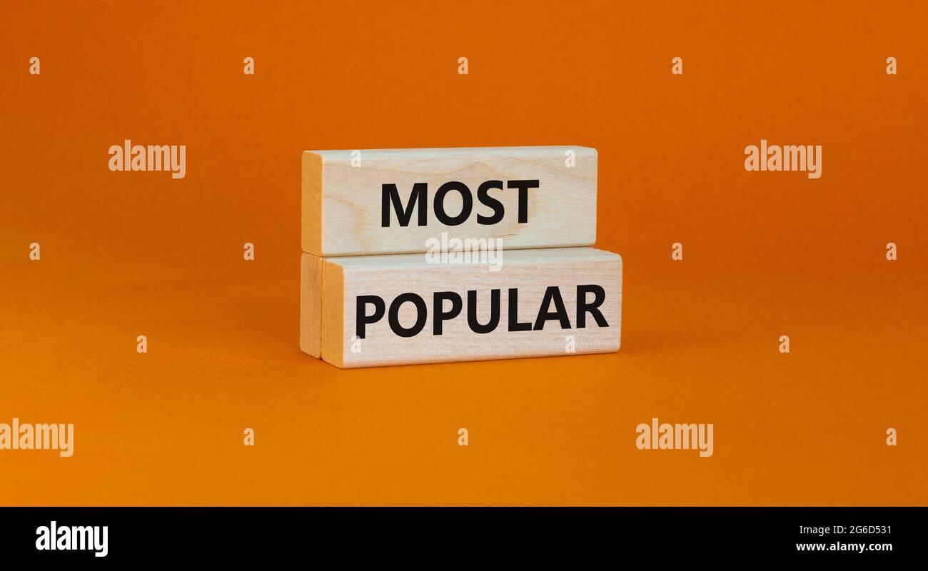 Most popular symbol. Concept words Most popular on wooden blocks on a ...