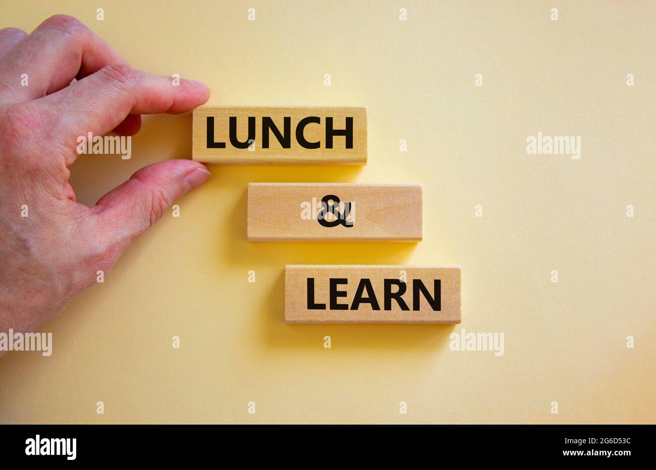 Lunch and learn symbol. Wooden blocks with concept words Lunch and ...