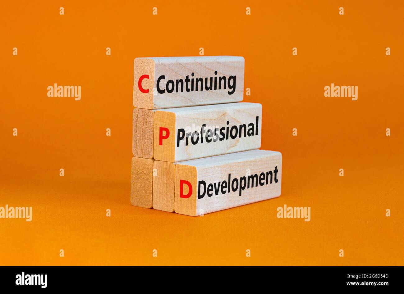 CPD, continuing professional development symbol. Wooden blocks with ...