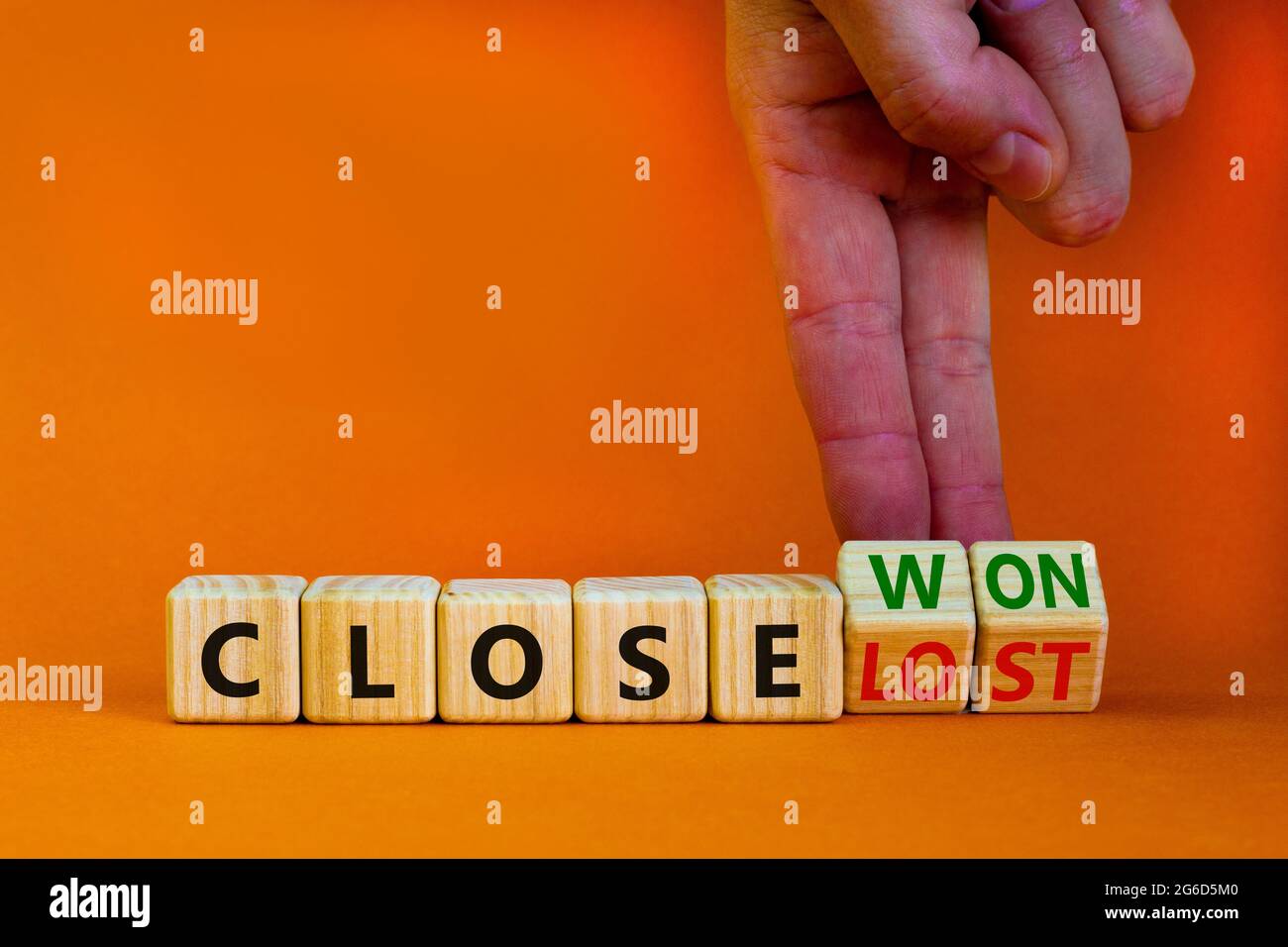 Close won or lost symbol. Businessman turns wooden cubes and changes ...