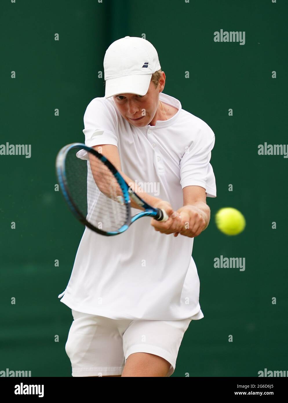 William Jansen in action against Bruno Kuzuhara in the boys' singles on ...
