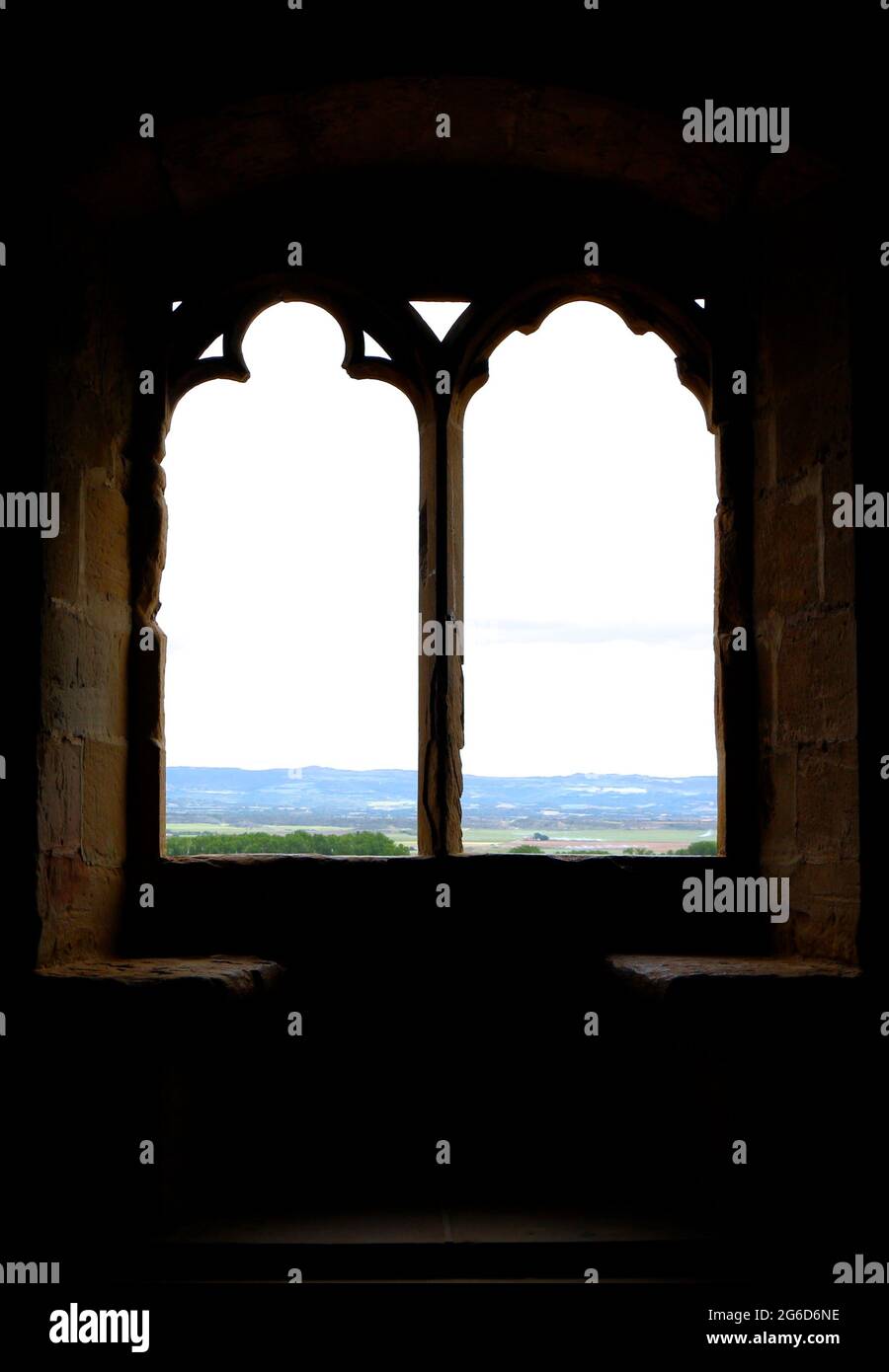 View through arched windows at the 13th century Palace of the Kings of ...