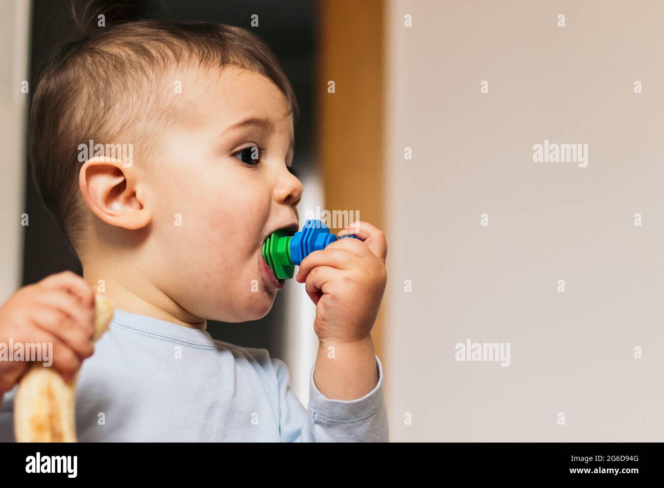 Baby biting toy hi-res stock photography and images - Alamy