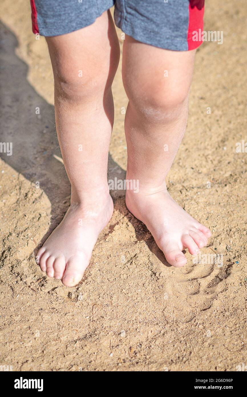 Child without shoes hi-res stock photography and images - Alamy