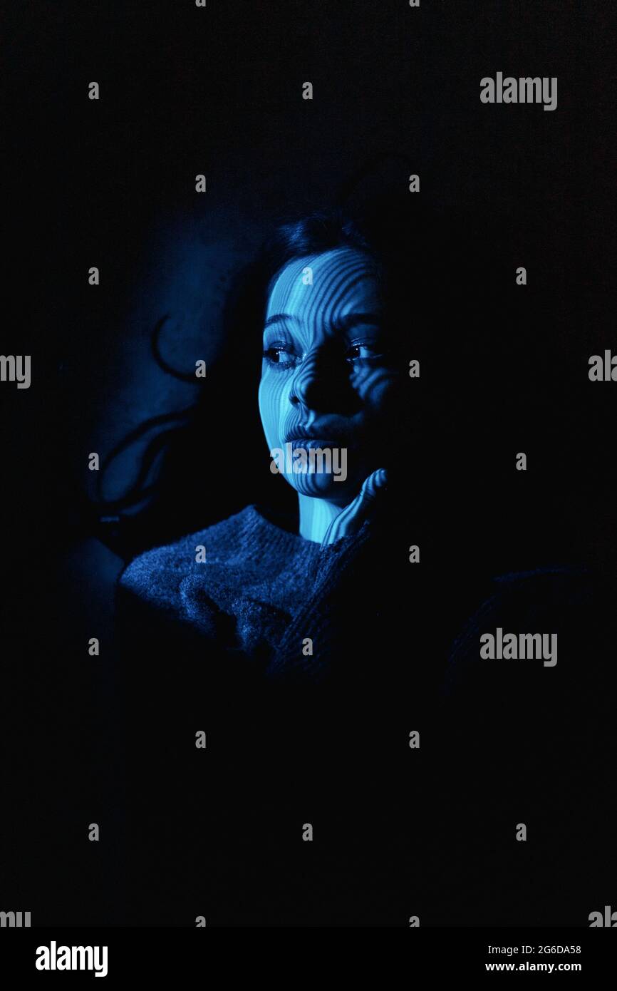 Woman face shadow mystery hi-res stock photography and images - Alamy