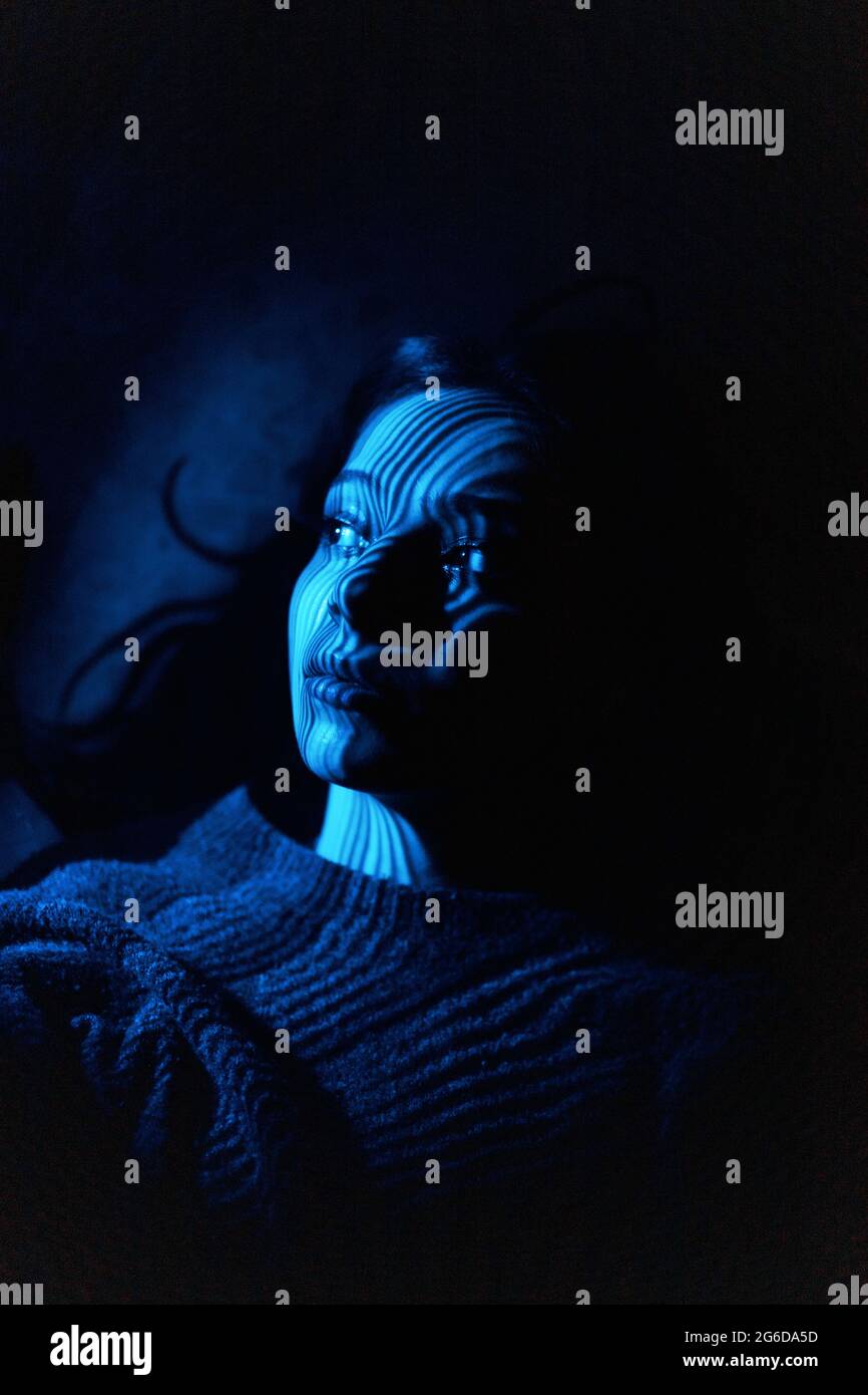 Woman face shadow mystery hi-res stock photography and images - Alamy