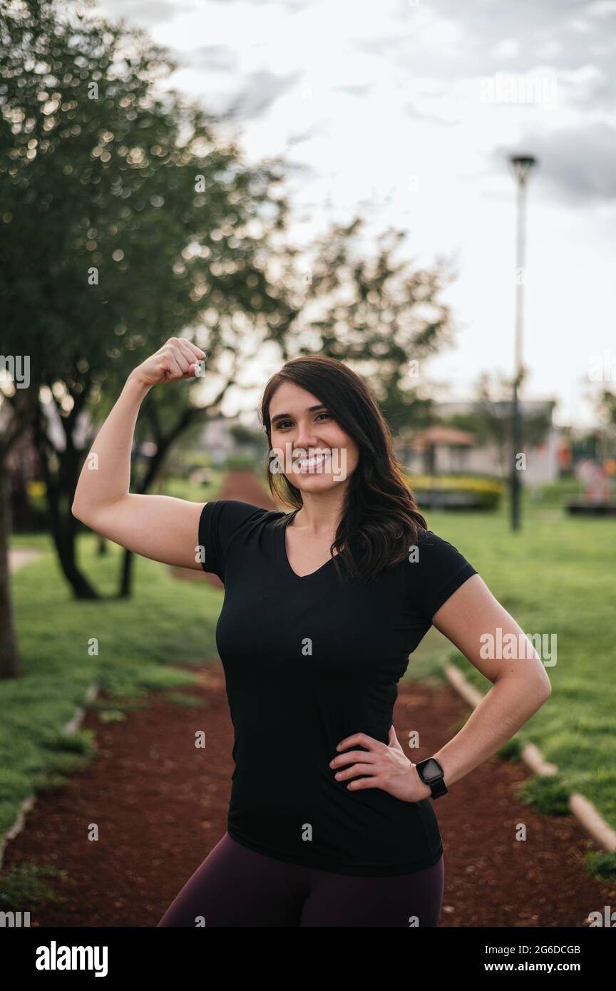 Female bodybuilder showing bicep hi-res stock photography and images ...