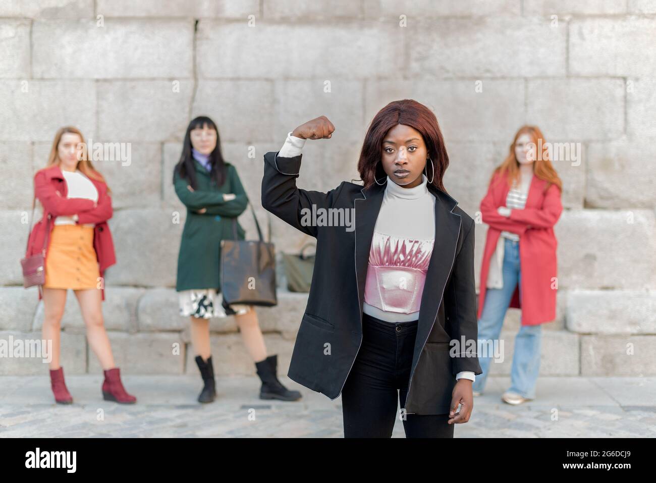Black power women fist hi-res stock photography and images - Alamy