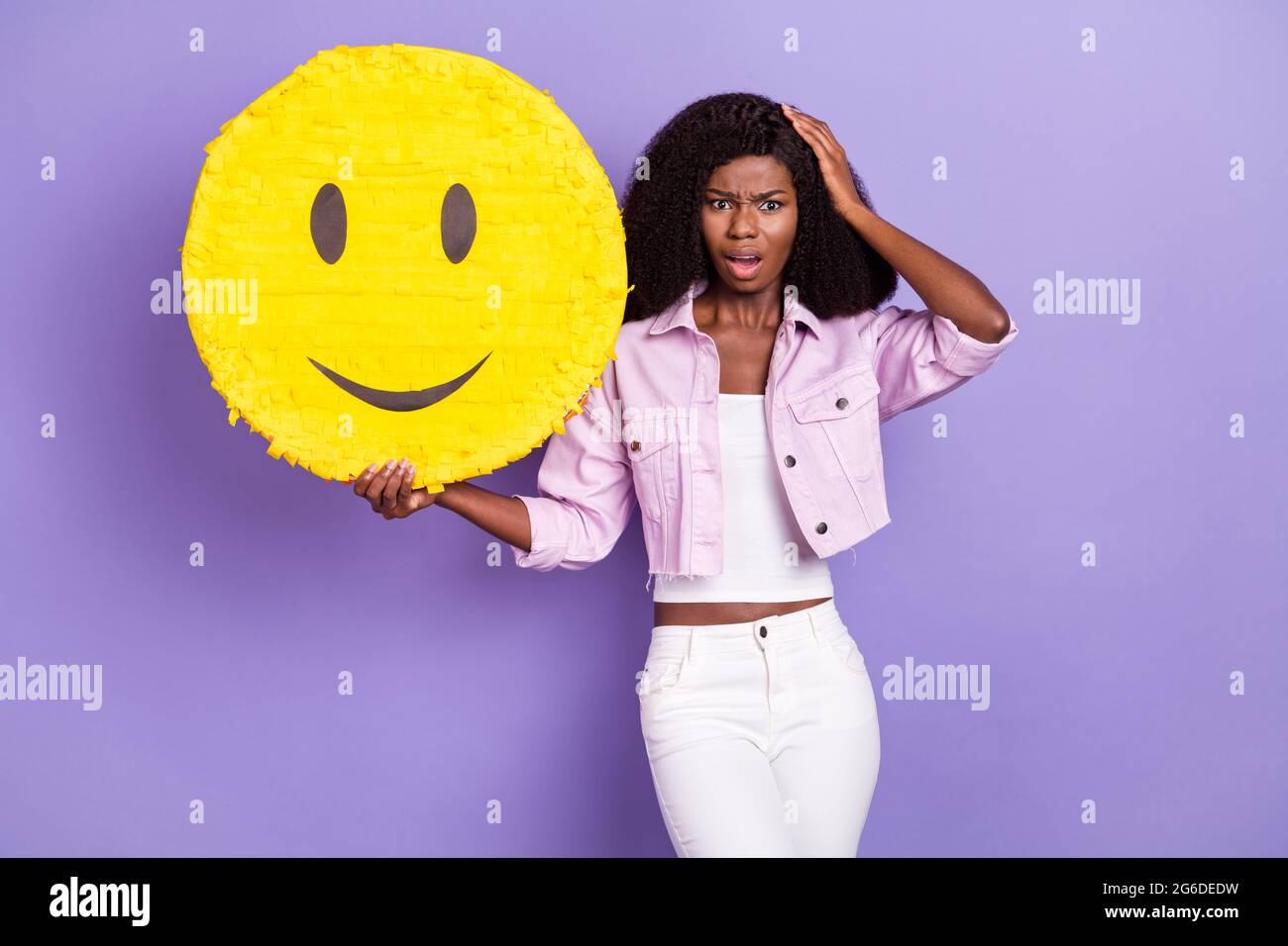 Photo of young shocked amazed surprised afro woman show big yellow ...
