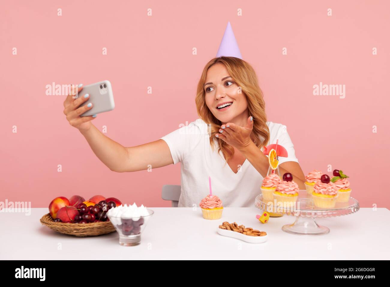 Happy blogger female broadcasting live stream with mobile phone ...