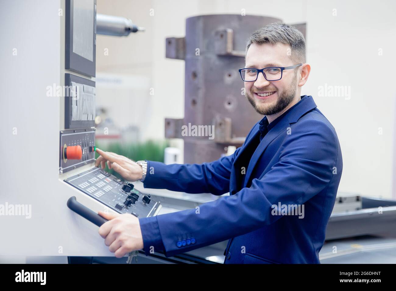 Robot operates hi-res stock photography and images - Alamy