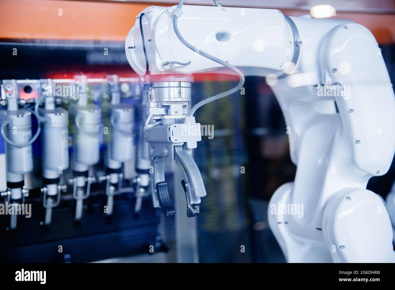 Closeup AI robot for working in industrial food factory packaging ice ...