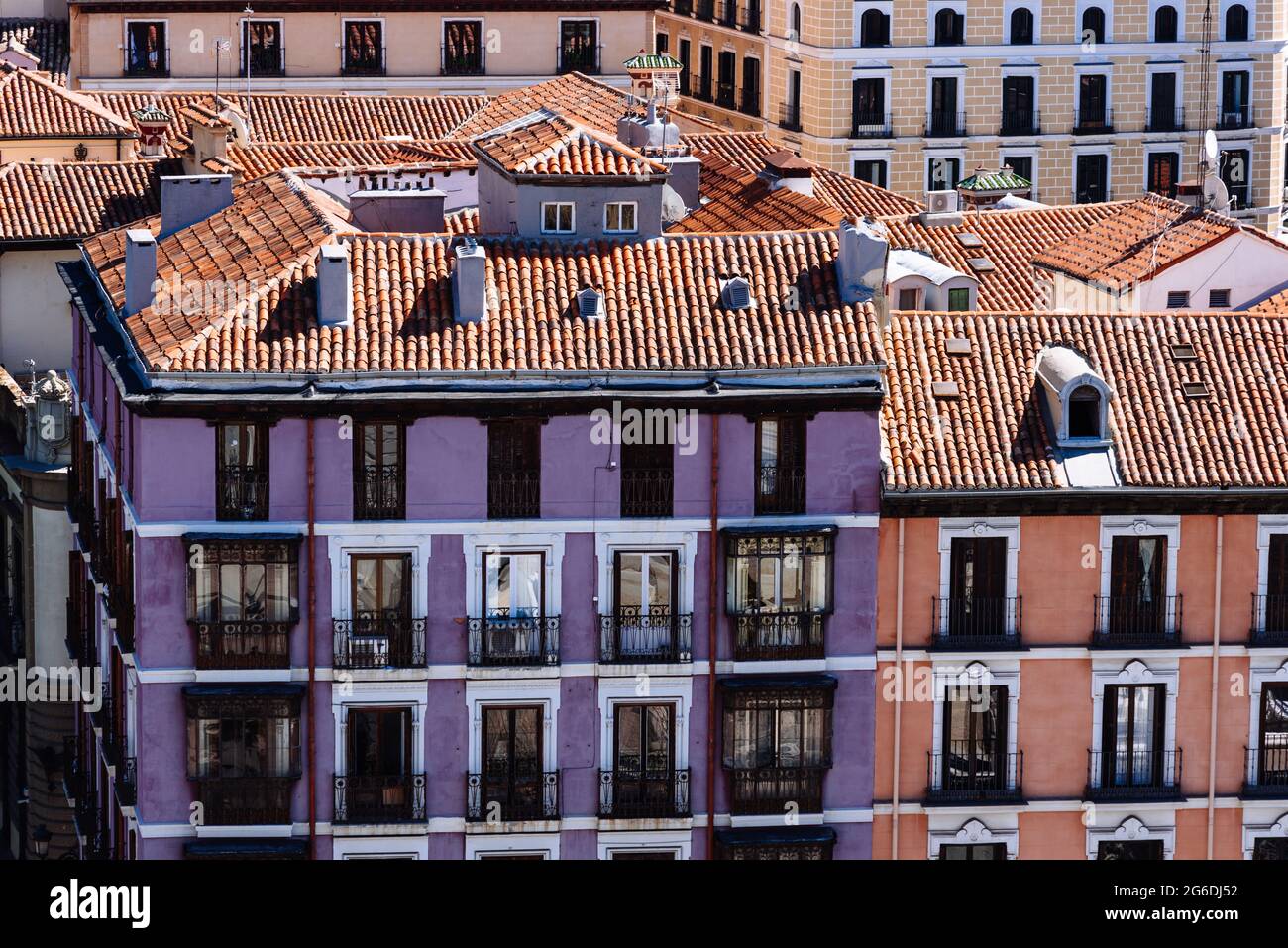 Traditional residential buildings in central Madrid. Colorful facades ...