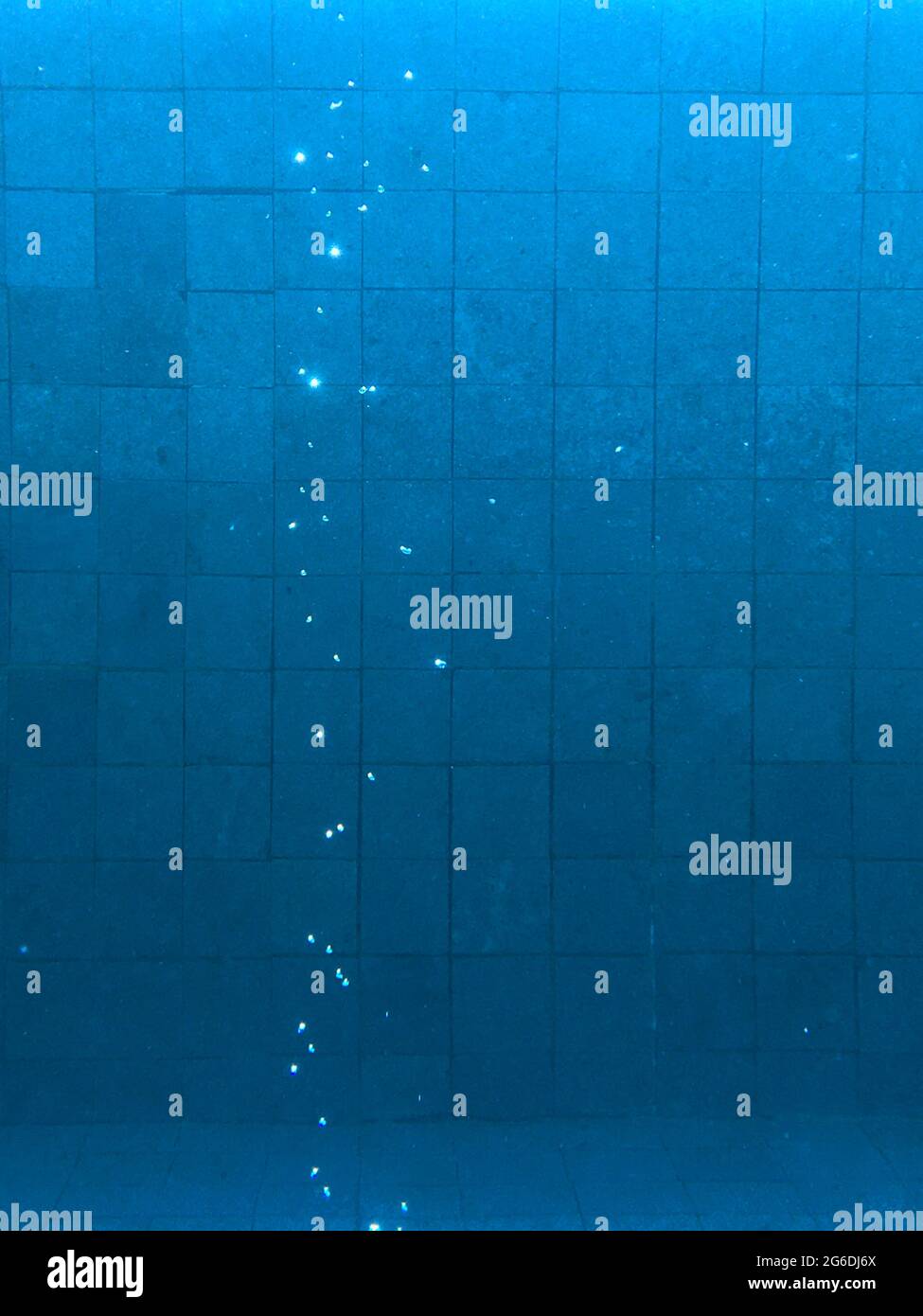 bubbles under the swimming pool.blue tile background Stock Photo - Alamy