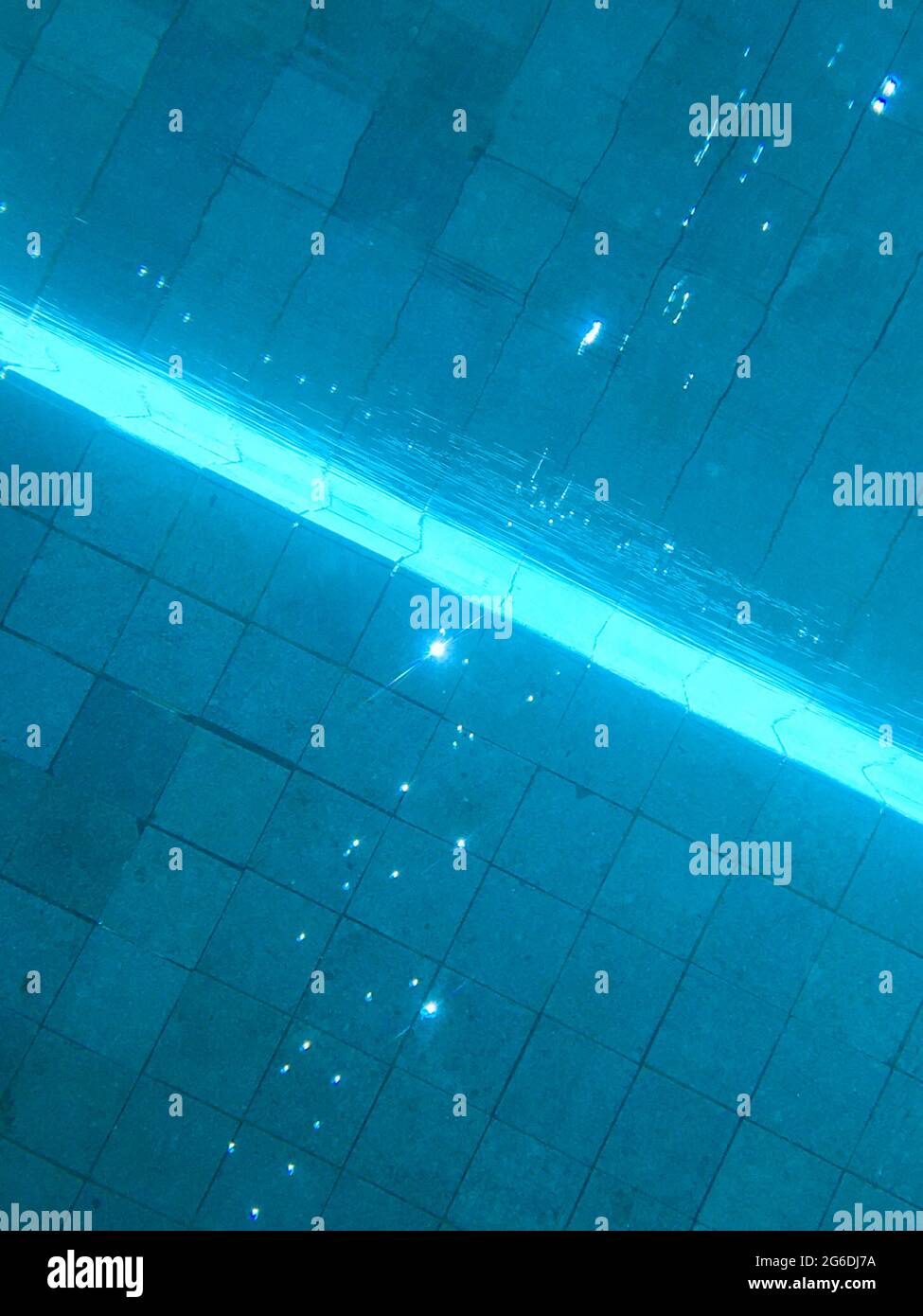 Underwater and surface reflections.blue tile background Stock Photo - Alamy
