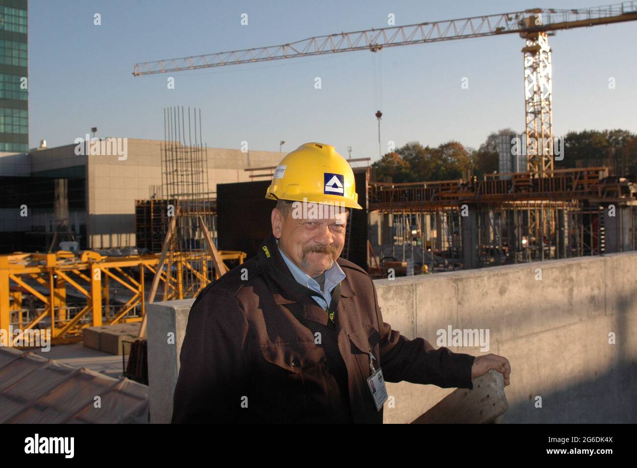 Polish construction worker male and construction work site inPoznan ...