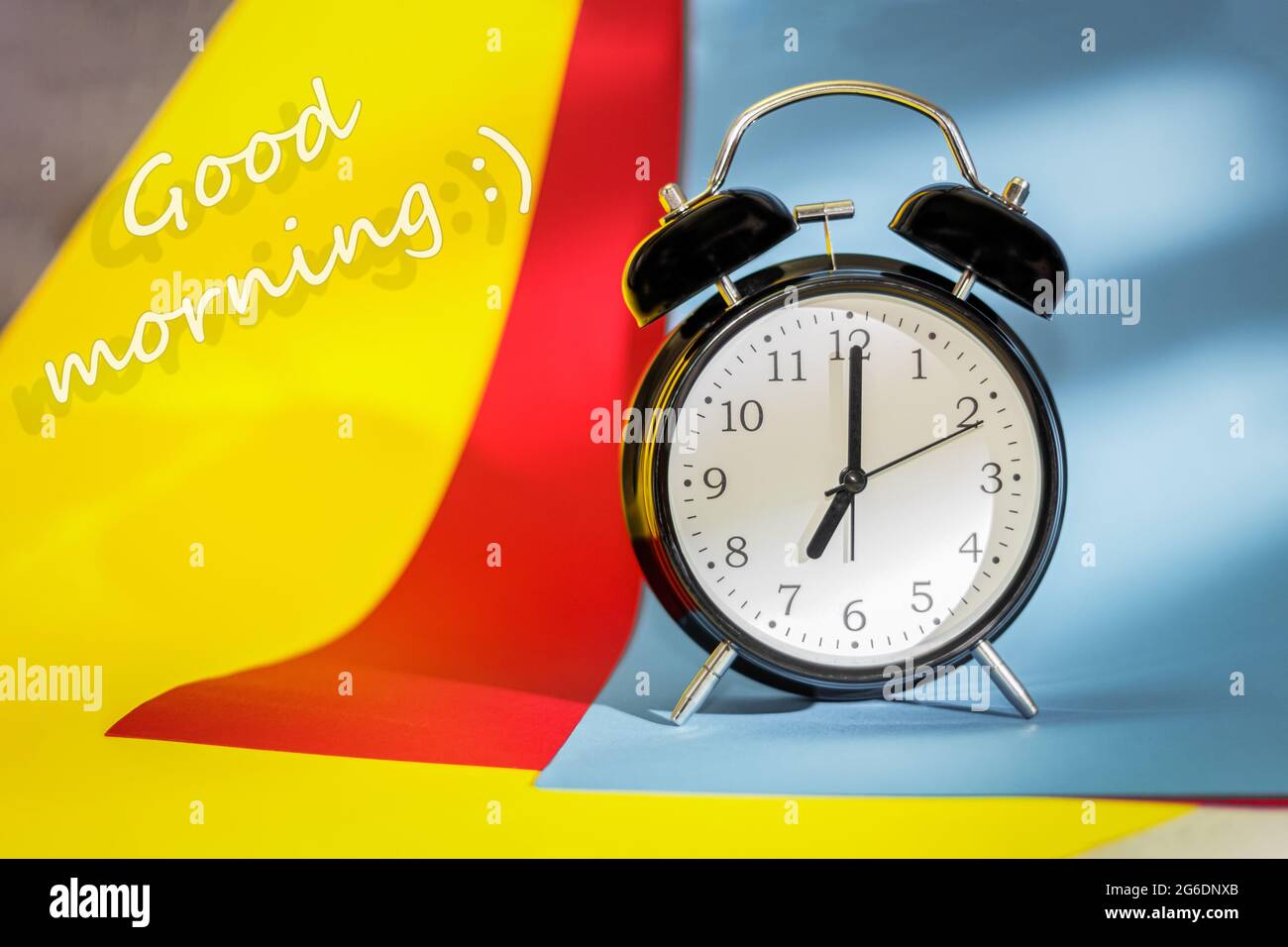 A black alarm clock indicates the time is 7:00 am and the text is good ...