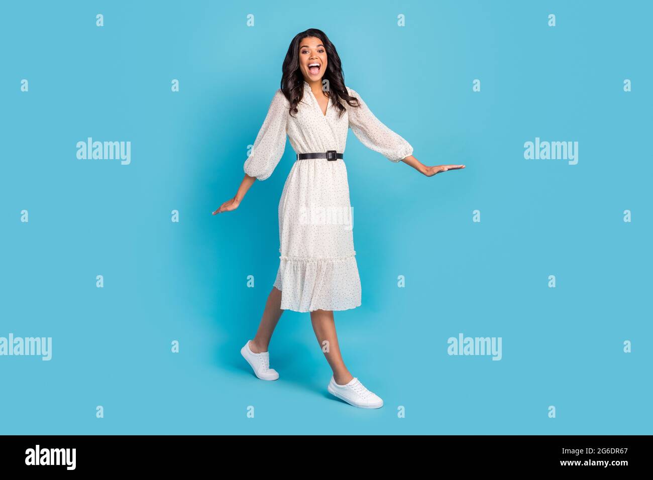 Full length body size view of attractive cheerful ecstatic girl walking ...