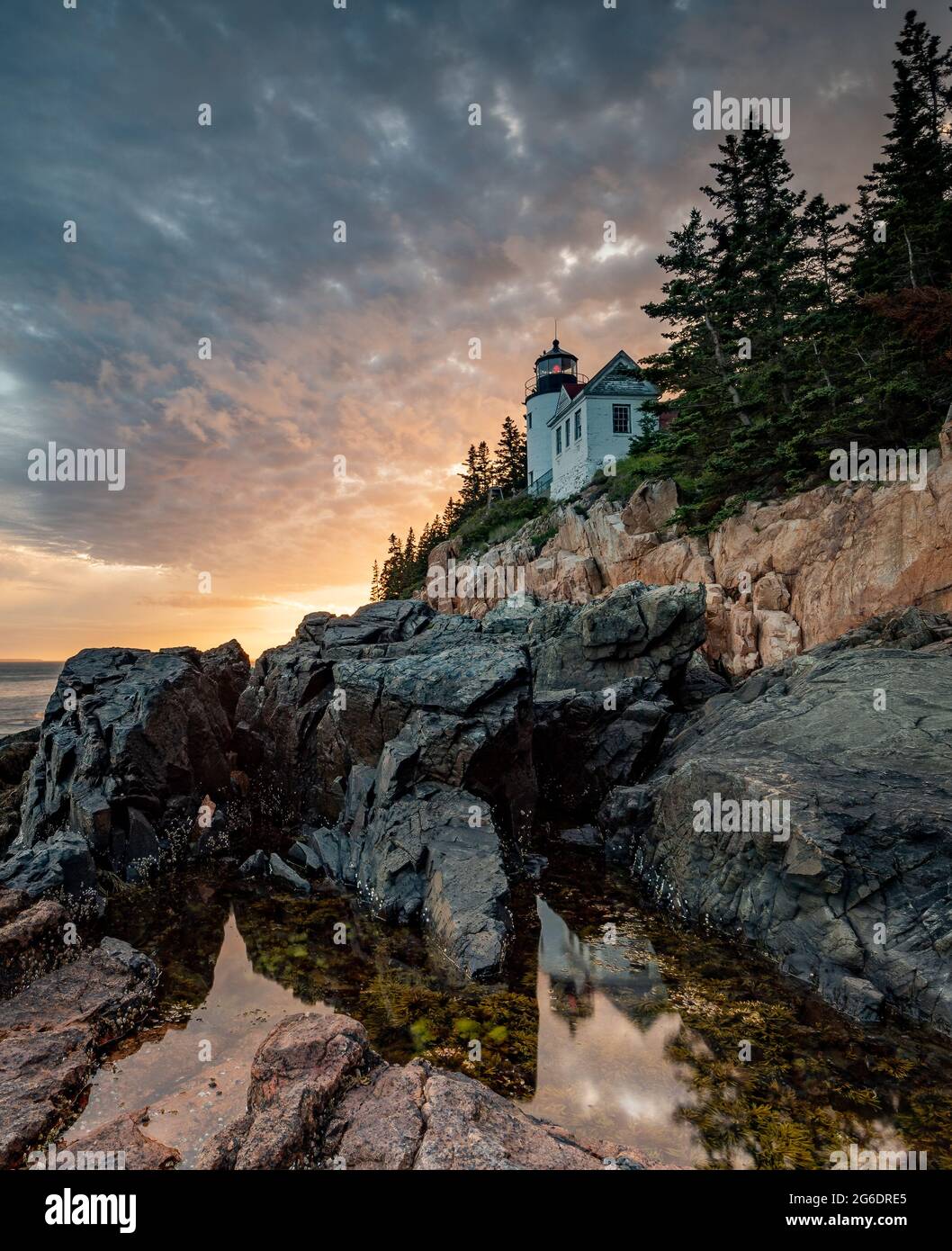 A lighthouse at sunrise Stock Photo - Alamy