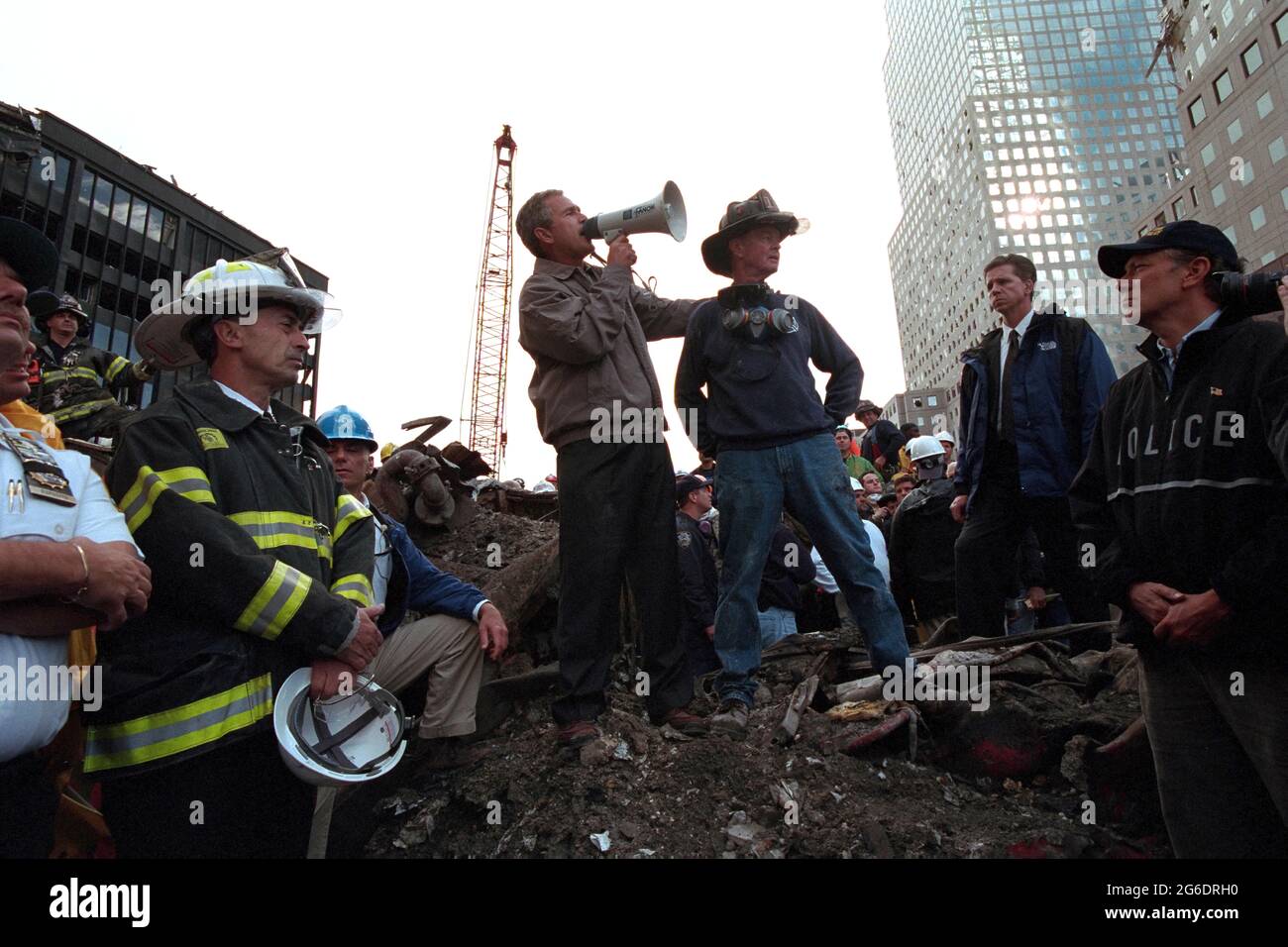 Standing atop rubble with retired New York City firefighter Bob ...