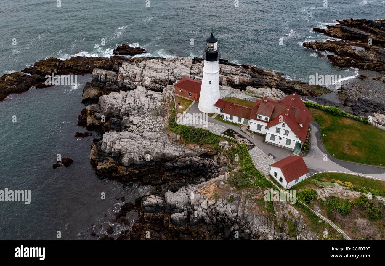 A lighthouse at sunrise Stock Photo - Alamy