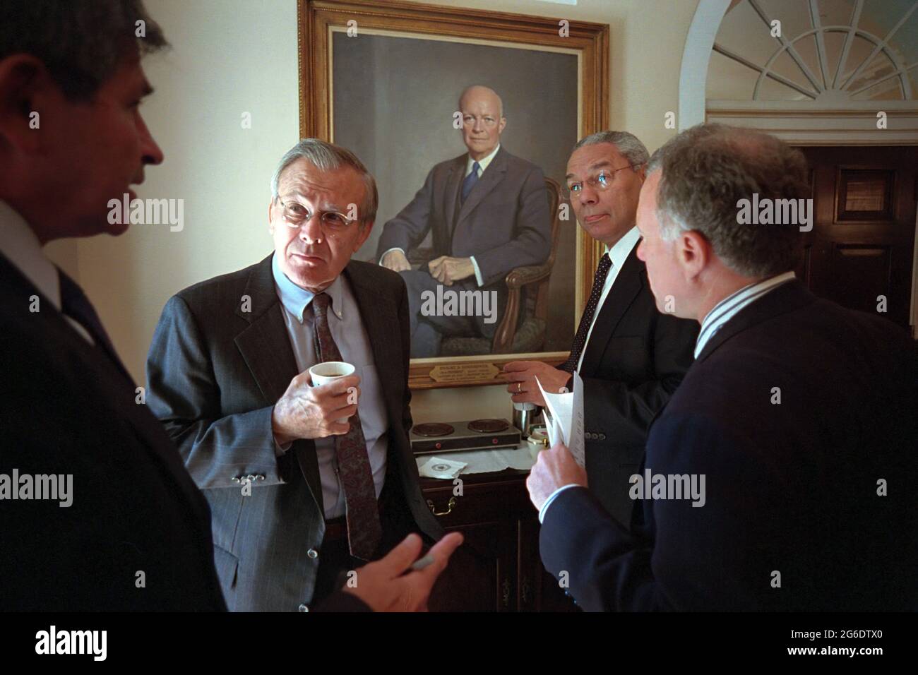 Defense Under Secretary Paul Wolfowitz talks with, from left, Donald ...
